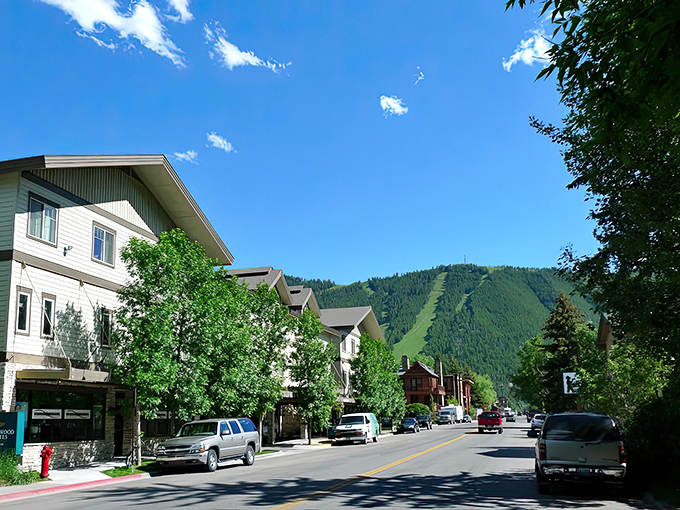Western storefronts line the streets where cowboy culture meets mountain sophistication in perfect harmony.