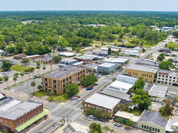 Perry's aerial view reveals what retirement dreams are made of: a verdant small town where your dollar stretches further than your morning yoga routine.
