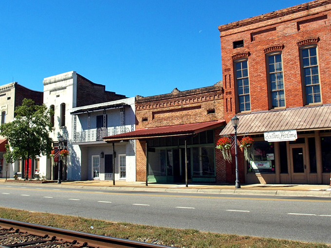 Historic brick facades line Brewton's main street, where your retirement dollars stretch further than your grandmother's famous pie crust.