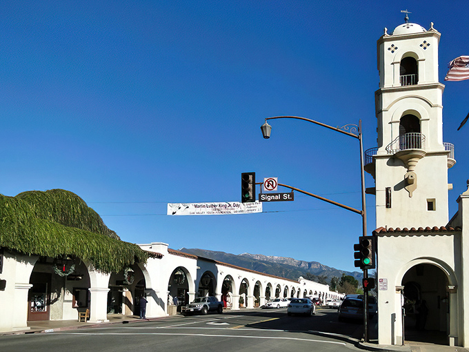 Ojai's iconic downtown arcade and bell tower stand like a Spanish mission mirage against the Topatopa Mountains, creating that postcard-perfect California moment.