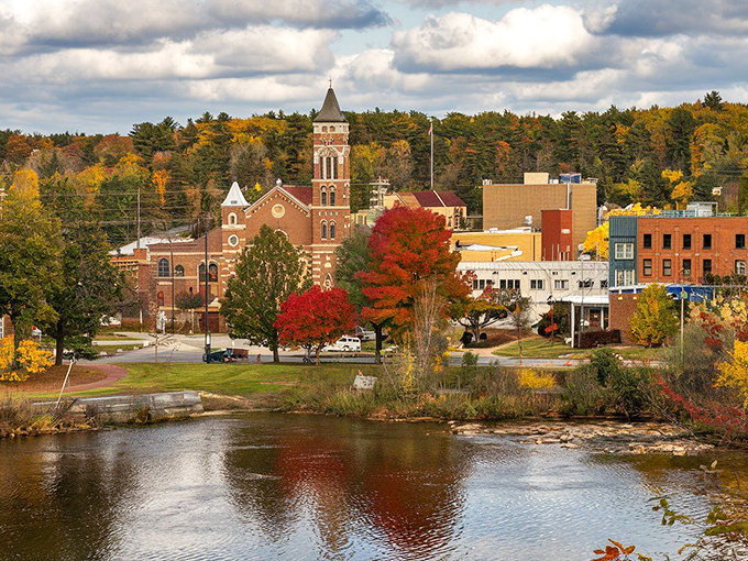 Windham's downtown skyline in autumn glory &ndash; where historic architecture meets nature's paintbrush, creating a scene that belongs on shortbread cookie tins everywhere.