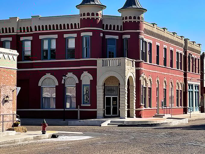 The iconic Bank Building stands as Abbeville's architectural crown jewel, its distinctive turrets watching over generations of locals living well within their means.