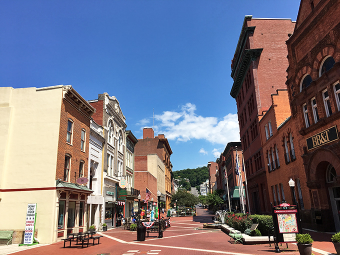 Downtown Cumberland bathes in golden sunshine, its brick-lined streets inviting you to stroll through history without the admission fee.