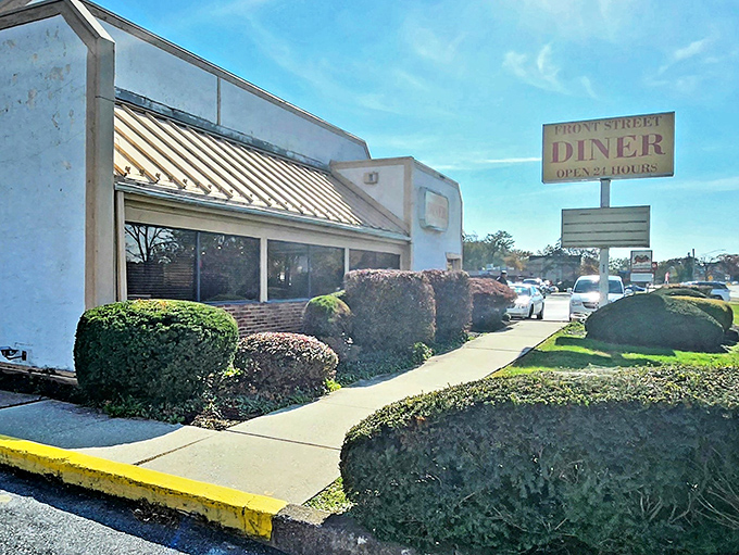 The unassuming exterior of Front Street Diner stands like a culinary time capsule against Harrisburg's skyline, promising comfort and Greek-infused delights within.