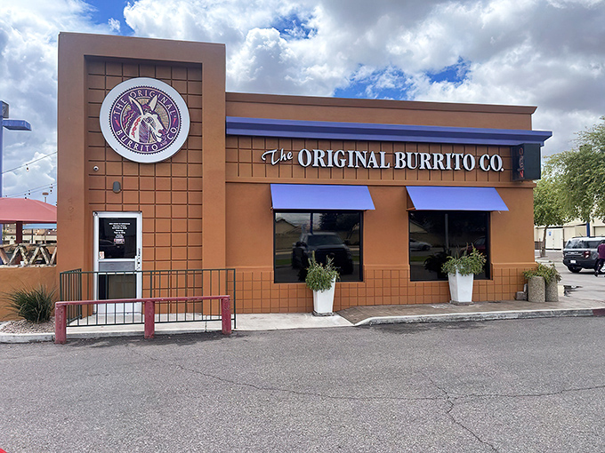 The terracotta fortress of flavor stands proudly against the Arizona sky, promising tortilla-wrapped treasures within.