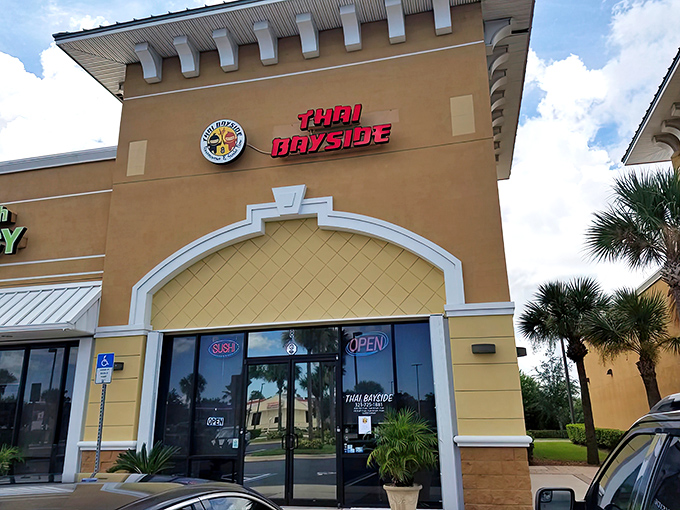 Thai Bayside's exterior might whisper, but its food shouts from the rooftops. That bright red signage is your beacon to bliss.