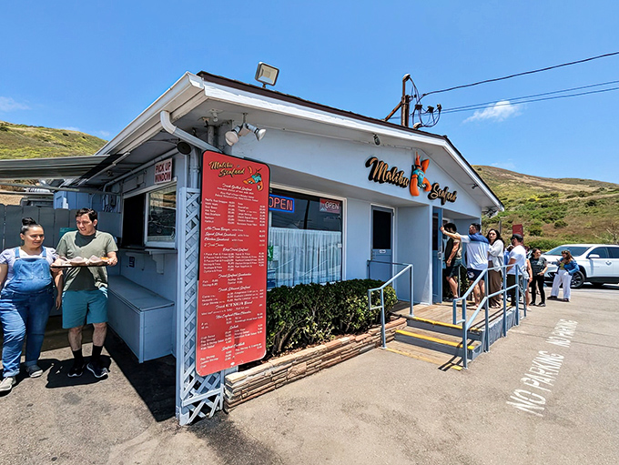 The iconic white building with its unmistakable red sign&mdash;Malibu's seafood shrine where pilgrims queue for ocean-fresh treasures.