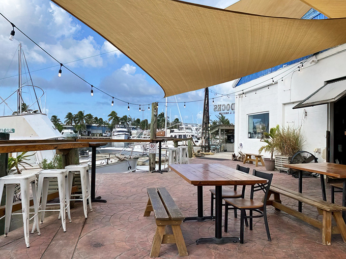 Paradise served with a side of sea breeze. The outdoor dining area offers front-row seats to Key West's marina life under sun-kissed canvas sails.