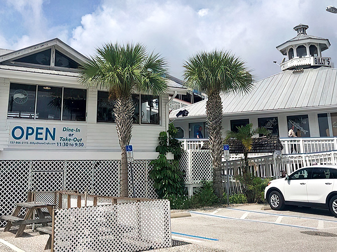 Billy's Stone Crab's white exterior with its iconic cupola stands like a lighthouse for seafood lovers in Tierra Verde.