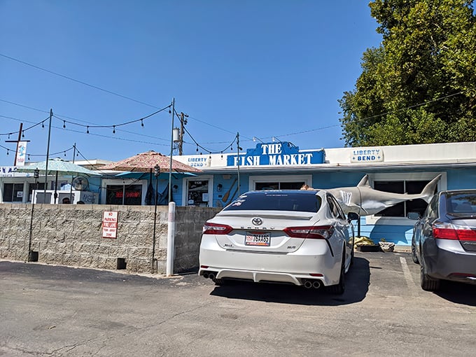 The Fish Market's unassuming exterior hides culinary treasures within &ndash; proof that in Missouri, seafood paradise can exist in a humble white building with blue trim.