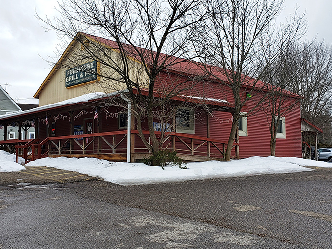 The red exterior of Rootstown Firehouse Grille & Pub stands ready to welcome hungry visitors, like a culinary lighthouse guiding flavor-seekers through Ravenna's dining landscape.