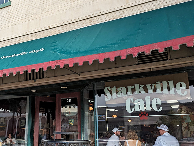 The iconic green and red awning of Starkville Caf&eacute; beckons hungry visitors like a lighthouse for breakfast lovers.