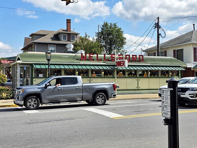 A gleaming stainless steel time machine where breakfast dreams come true. The barrel-roof and classic diner layout scream "America's greatest food invention."