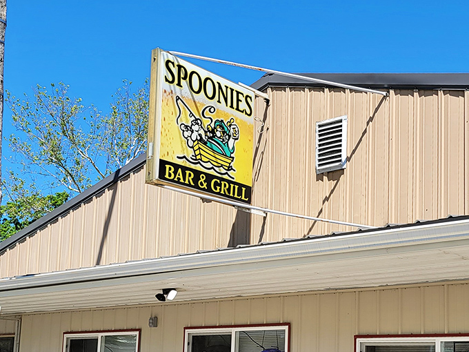 That same cheerful sign against blue skies promises adventure, or at least a really satisfying food coma.