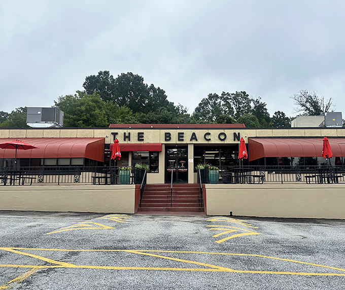 The iconic red awnings and classic signage of The Beacon welcome hungry visitors like an old friend who's been saving your seat since forever.