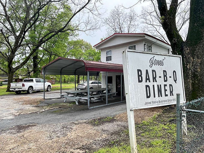 The humble white exterior of Jones Bar-B-Q Diner belies the culinary treasure within. Like finding Shakespeare performing in a garden shed &ndash; unassuming yet legendary.