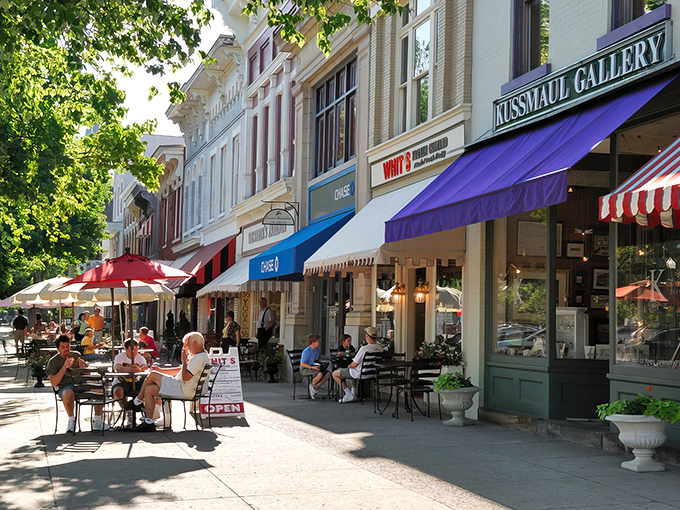 Broadway's colorful awnings and outdoor caf&eacute;s create the perfect stage for Granville's daily small-town theater. People-watching here rivals any European plaza.