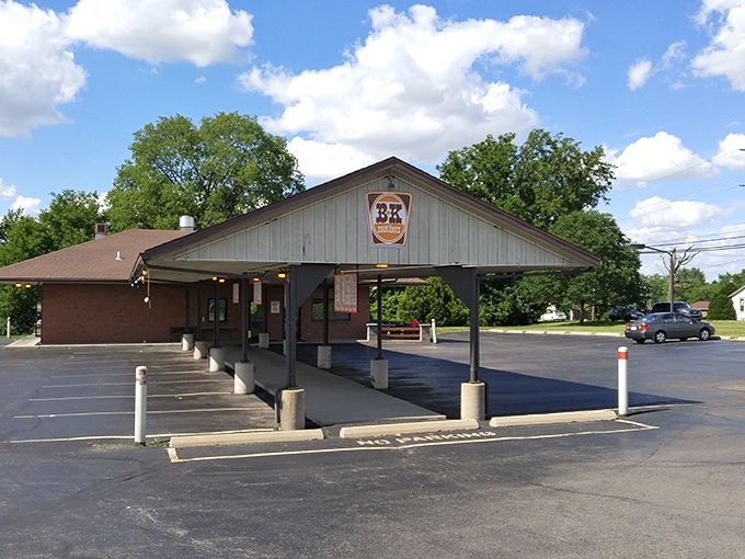 The classic drive-in canopy beckons like a time portal to simpler days when carhops, conversation, and killer Spanish Dogs were the perfect trifecta of American dining.