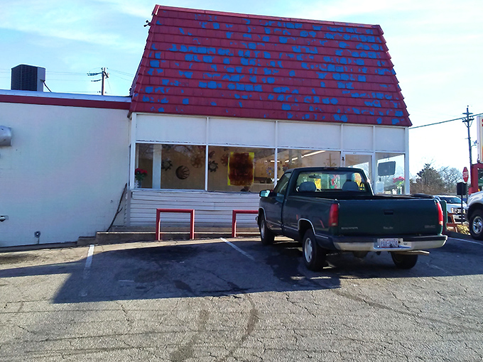 The iconic red-roofed building stands like a breakfast beacon in Henderson. Simple on the outside, magical on the inside.
