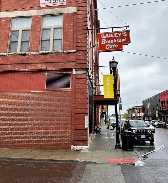The iconic orange sign beckons hungry travelers like a breakfast lighthouse on Walnut Street. Springfield's historic brick buildings never looked so appetizing.