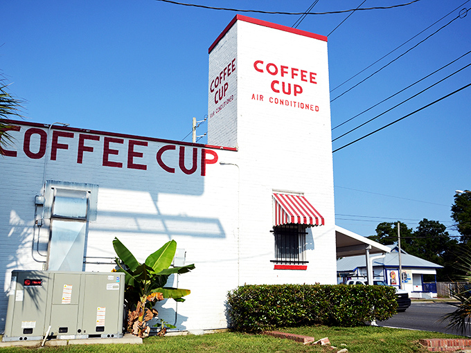 The unassuming white exterior of Coffee Cup Restaurant has been welcoming hungry Pensacolians since 1945, proving that breakfast greatness doesn't need fancy architecture.