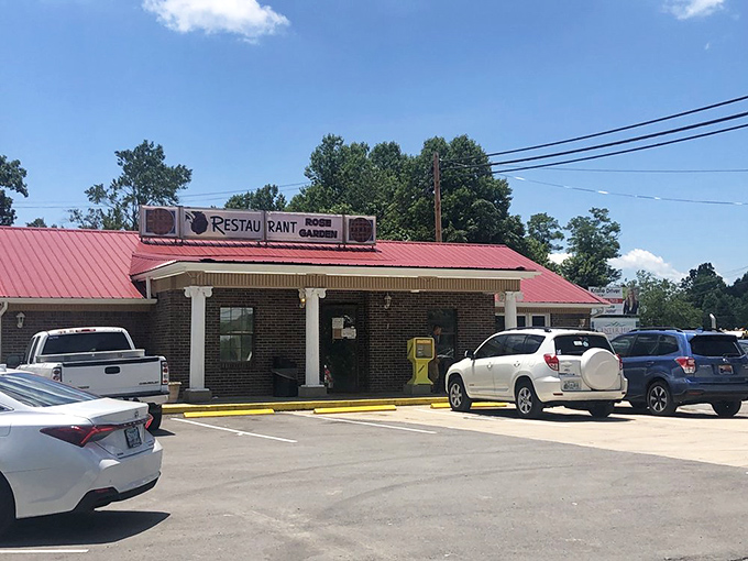 The humble brick exterior with its bright red roof promises no frills, just honest-to-goodness food that'll make your taste buds stand up and salute.