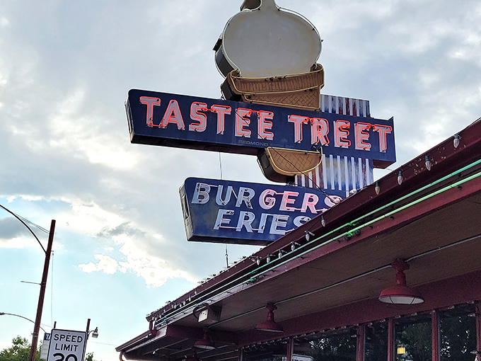 The iconic Tastee Treet sign beckons hungry travelers like a neon lighthouse in a sea of chain restaurants. Classic Americana at its finest.