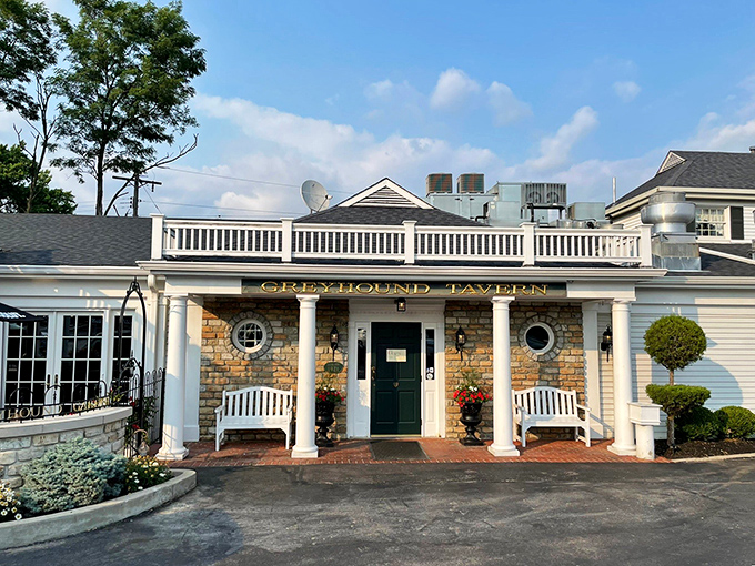 The iconic stone facade of Greyhound Tavern welcomes you like an old friend, those white rocking chairs practically begging you to sit a spell before dinner.