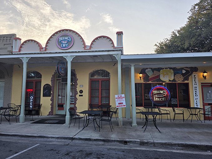 The scalloped facade of Maxine's welcomes hungry travelers like a culinary lighthouse on Bastrop's Main Street. Small-town charm with big-time flavor potential.