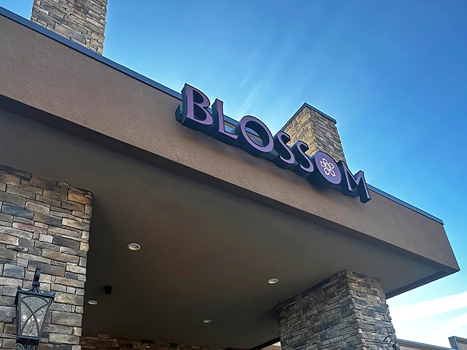 The stone facade entrance to Blossom Buffet stands like a culinary gateway to paradise, promising delights that transcend typical buffet expectations.