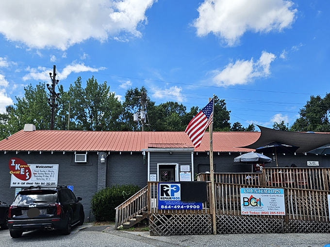 That distinctive red roof and American flag aren't just decoration &ndash; they're a beacon calling burger pilgrims home to Spartanburg greatness.