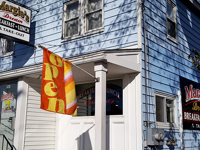 That bright orange "OPEN" flag isn't just an invitation&mdash;it's a siren call to those who understand true diner happiness awaits inside.