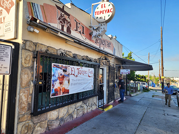 Morning sunlight bathes El Tepeyac's exterior, where the weathered stone walls hold decades of stories and the promise of tortilla-wrapped treasures within.
