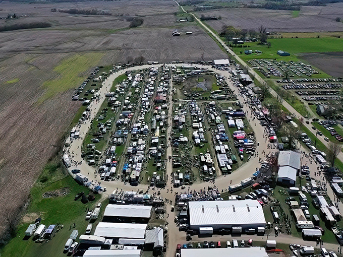 An aerial view that reveals the true scale of What Cheer Flea Market&mdash;like a small city dedicated entirely to the art of the deal.