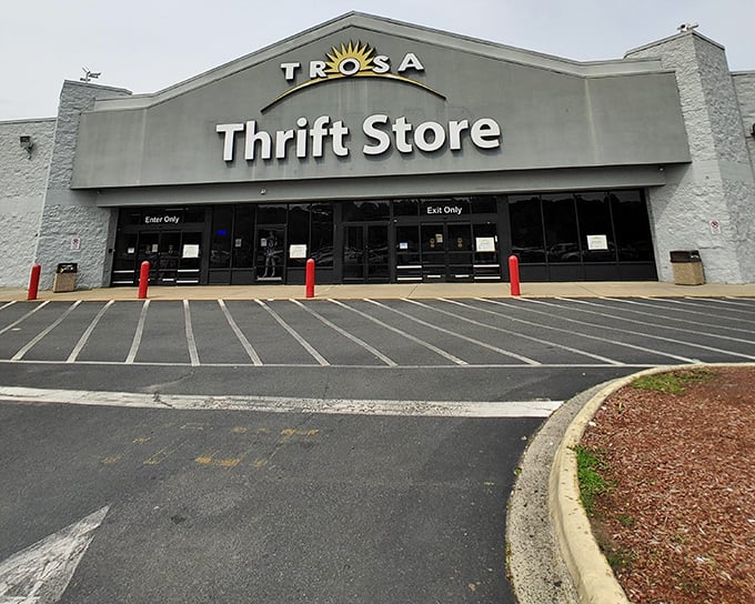 The unassuming exterior of TROSA Thrift Store stands like a treasure chest waiting to be opened, promising adventures in bargain hunting behind those modest doors.