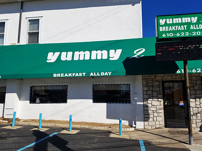 That green awning beckons like a beacon of breakfast hope along Baltimore Pike, promising comfort food awaits inside.