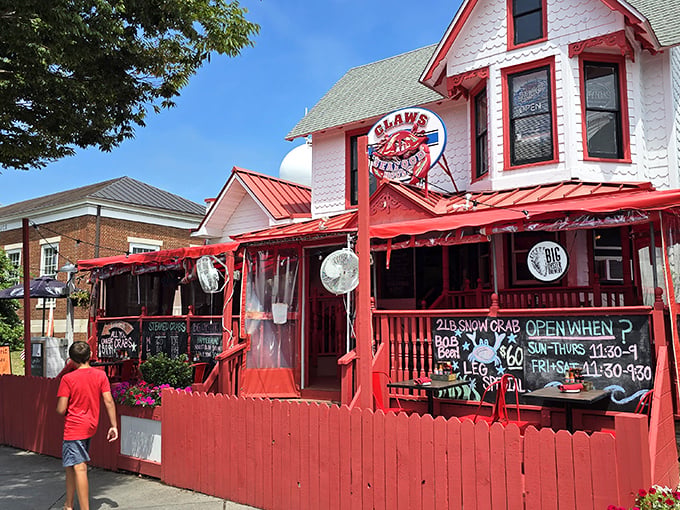 The red-trimmed Victorian house screams "seafood sanctuary!" Claws' vibrant exterior promises coastal comfort food that'll make you forget your diet resolutions until tomorrow.