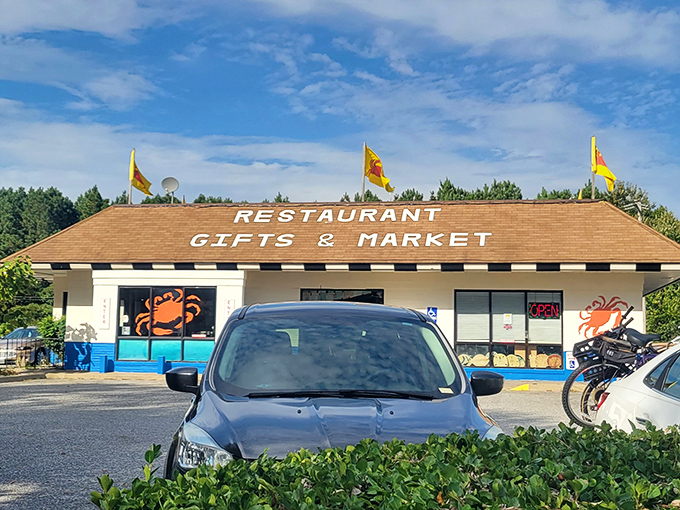 The roadside charm of The Great Machipongo Clam Shack beckons seafood lovers like a siren call to sailors. Those crab paintings aren't just decoration&mdash;they're a promise.