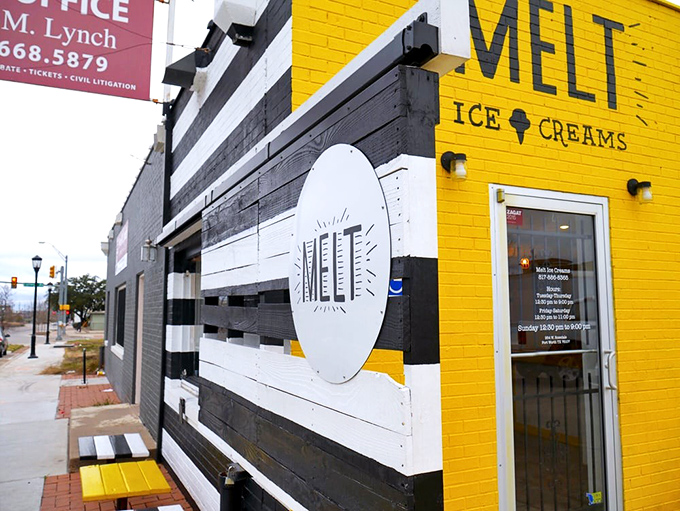 That unmistakable black and white striped facade promises serious ice cream business awaits inside this Fort Worth gem.