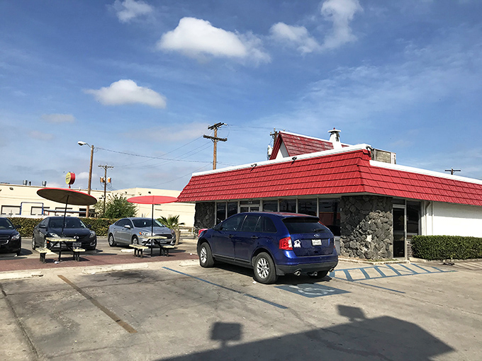 From another angle, Griff's distinctive silhouette promises comfort food salvation. That stone facade has witnessed decades of burger cravings being gloriously satisfied.