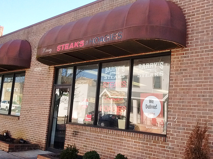 The unassuming brick façade of Barry's hides Philadelphia's best-kept cheesesteak secret. That burgundy awning might as well be a superhero cape.