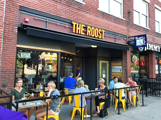 Downtown Lawrence's brick-lined streets set the perfect stage for The Roost's bright signage &ndash; like a beacon calling breakfast lovers home.