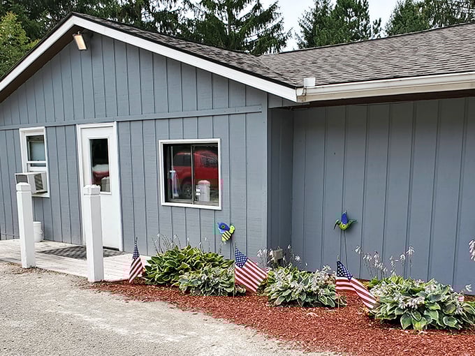 The humble blue walls of Capricorn Inn might not turn heads, but behind them waits fried pickle perfection that locals guard like a hometown secret.