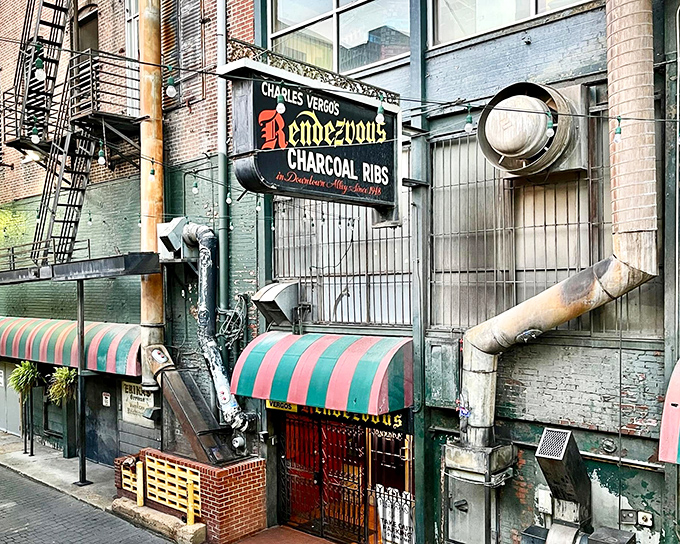 The alleyway entrance to barbecue paradise. Like finding the secret door to Narnia, except instead of a magical wardrobe, you get magical ribs.
