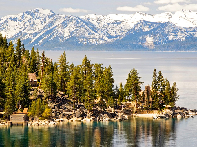 Lake Tahoe's sapphire waters meet snow-capped Sierra peaks in a view that makes smartphone cameras weep with inadequacy. Nature showing off again!