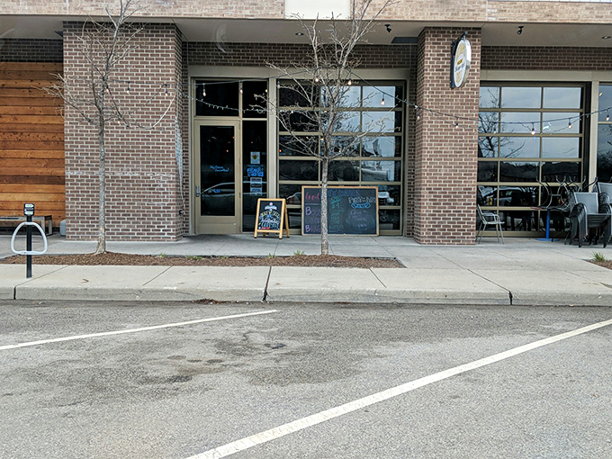 Fat Dan's exterior blends seamlessly into its urban surroundings, with chalkboard menus promising culinary treasures within.