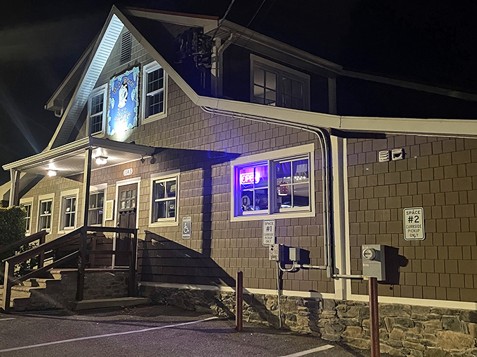 The Old Stein Inn glows invitingly at night, a Bavarian beacon promising German cuisine perfection in the heart of Maryland.