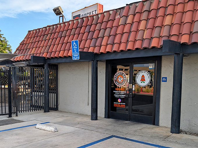 That terracotta-tiled roof isn't hiding a secret NASA facility, but something equally impressive: Fresno's temple to transcendent garlic fries and craft brats.
