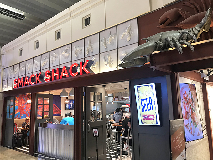 The neon-red "SMACK SHACK" sign glows like a lighthouse beacon for seafood-starved Midwesterners, promising coastal treasures in the heart of Minneapolis.