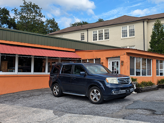 The unassuming orange exterior might not scream "culinary destination," but that's exactly how the best food discoveries happen. Treasure awaits inside.